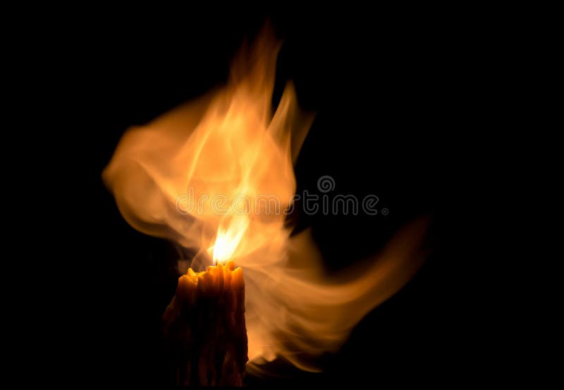 Candle Flame with Exploding Flammable Liquid Sprayed Onto Flame ...