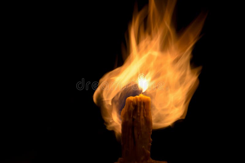Candle Flame with Exploding Flammable Liquid Sprayed Onto Flame ...