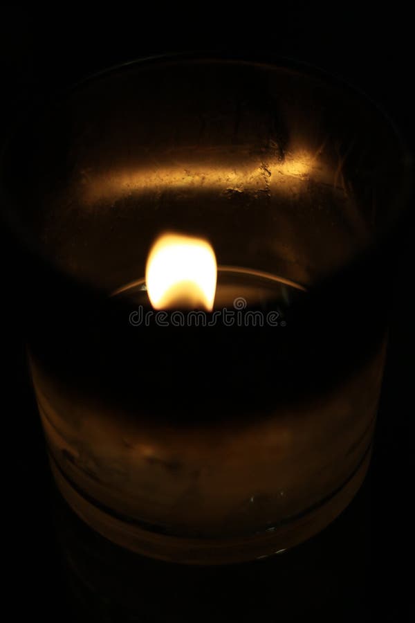 Candle Flame in a Soot-stained Glass Stock Image - Image of glow ...
