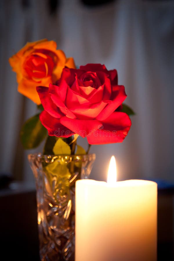 Candle and flowers stock photo. Image of orange, wedding - 43842588