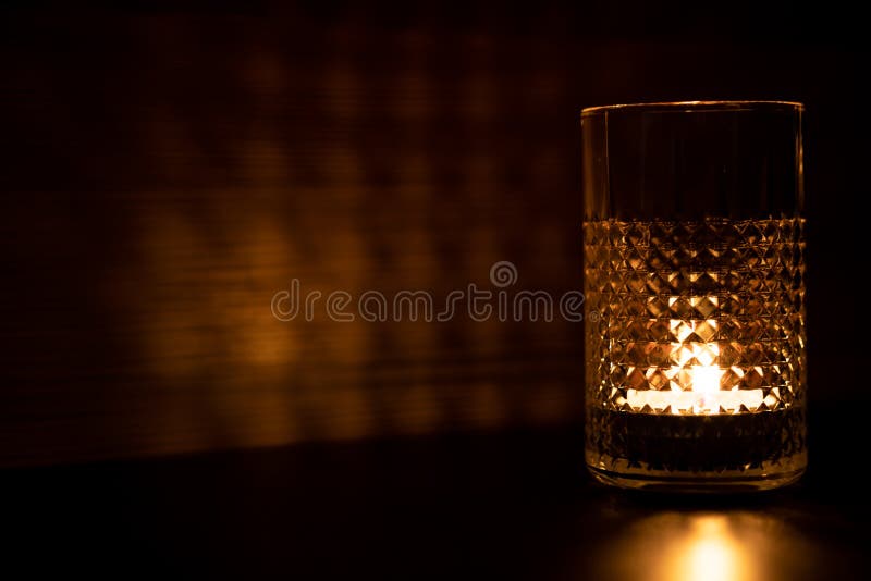 Candle in a Glass. Rays of Light are Refracted through the Walls of the ...