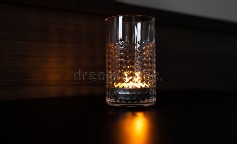 Candle in a Glass. Rays of Light are Refracted through the Walls of the ...