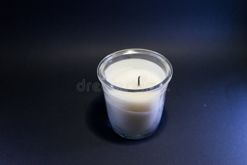 Candle without Light Inside the Small Glass and Black Background Stock ...