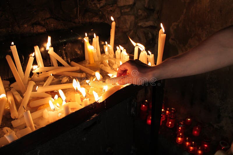 Candle Lighting stock image. Image of finger, church - 133674571