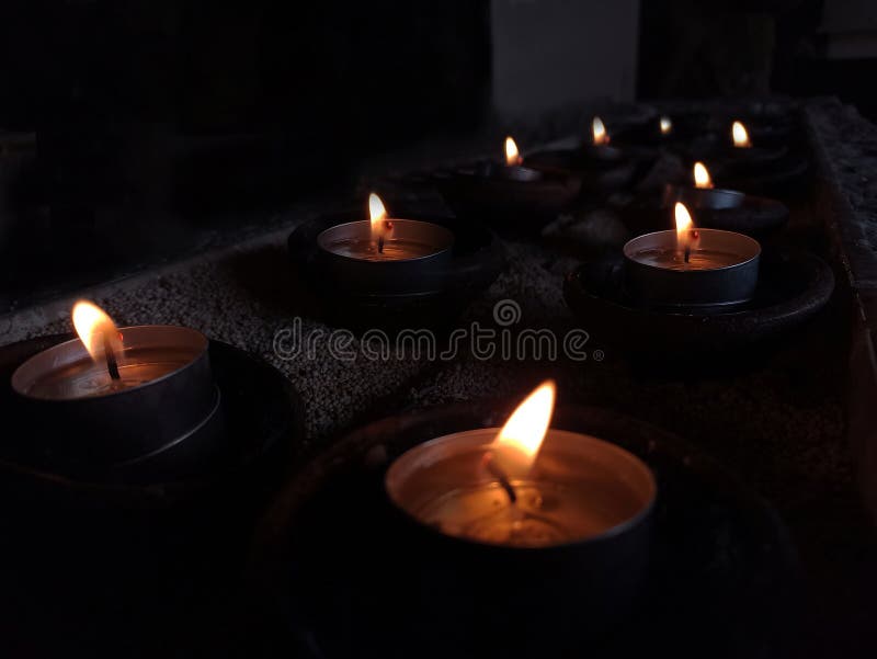 Candle Lights in the Night on Dark Background. Light of Candles ...