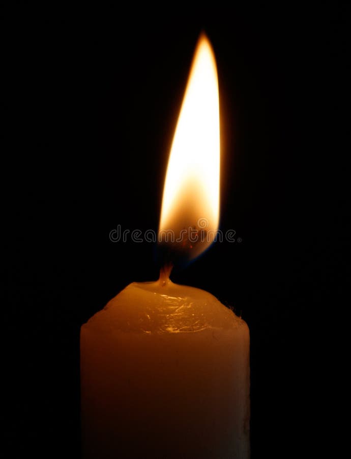A Candle is Lit and the Flame is Yellow Stock Image - Image of candle ...