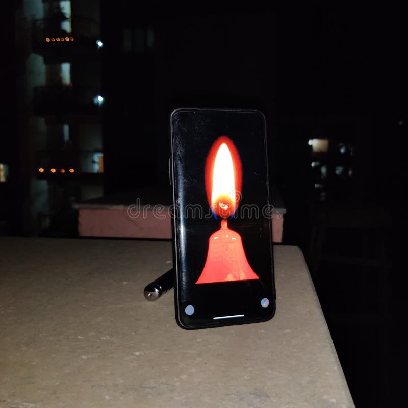 Candle in mobile stock image. Image of candle, stage - 253305565
