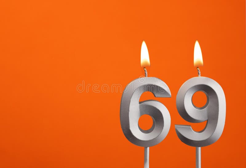 Candle Number 69 - Birthday in Orange Background Stock Photo - Image of ...