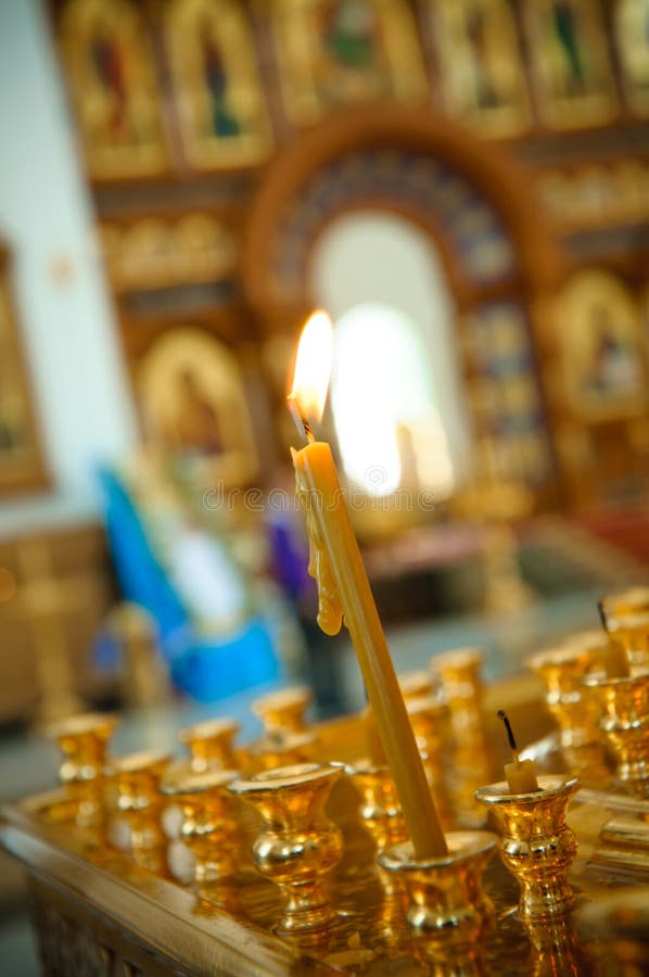 Candle in orthodox church stock image. Image of igniting - 17604099