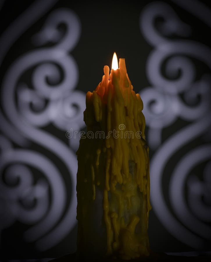 Candle with Pattern and Textured Colourful Shadowed Background Stock ...