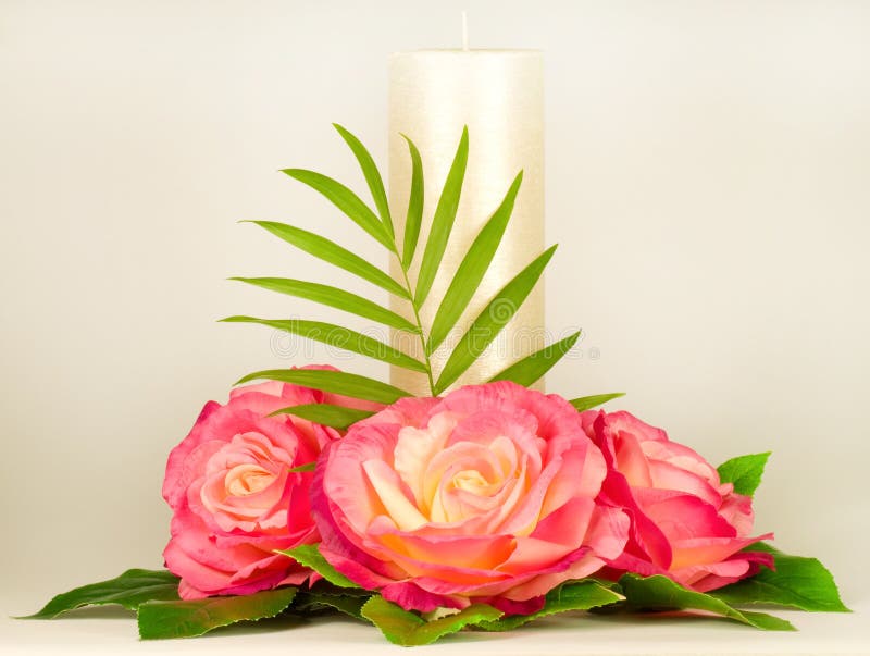 Candle and roses stock image. Image of spring, pink, health - 22721143
