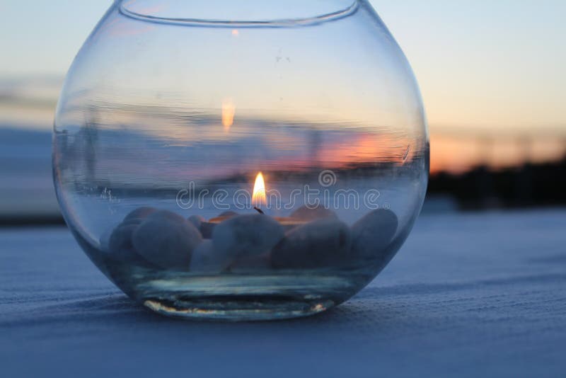 Candle in sunset stock image. Image of beautiful, nature - 70940071