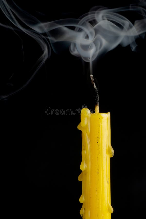 Candle with Wax Dripping and Smoke Patterns Curling from Wick ...