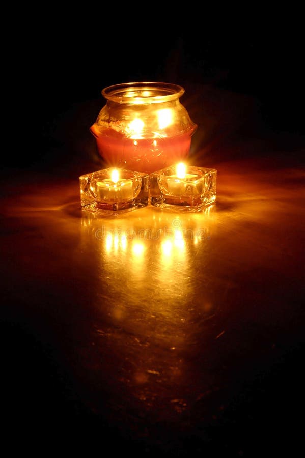 Glowing Candles stock photo. Image of orange, candlelight - 9831974