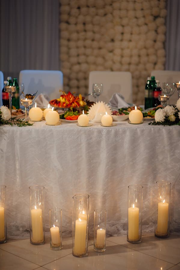 Candles on the Table in the Restaurant. Table Setting in a Cafe Stock ...