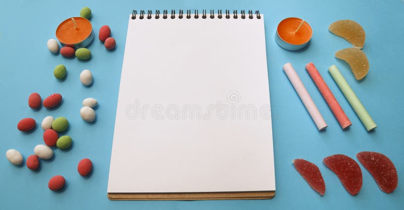 Candles, Colored Crayons, Peanuts in Colored Glaze, Notebook for Stock ...