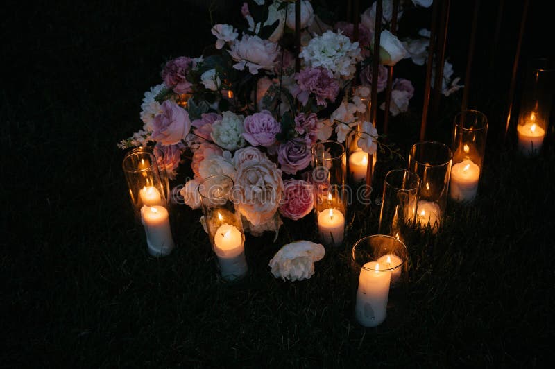 Candles in Glass Cups at the Wedding Stock Image - Image of flower ...