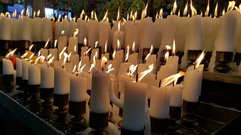 Candles Light Up As an Offering To the Gods. Stock Image - Image of ...