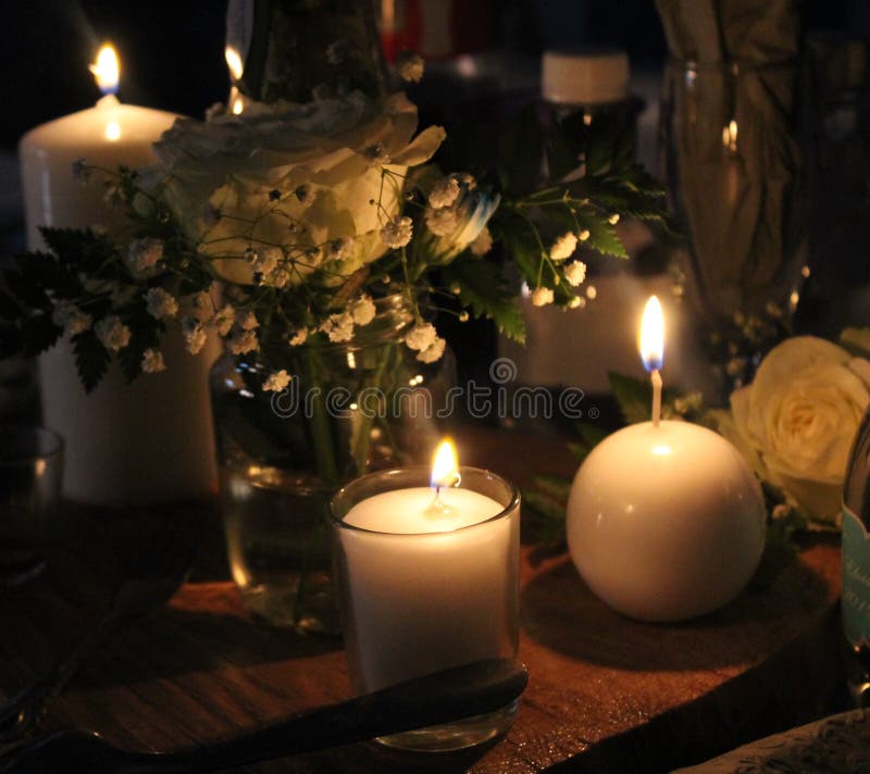 Candles Lit with Flowers - Stunning Stock Image - Image of flowers ...