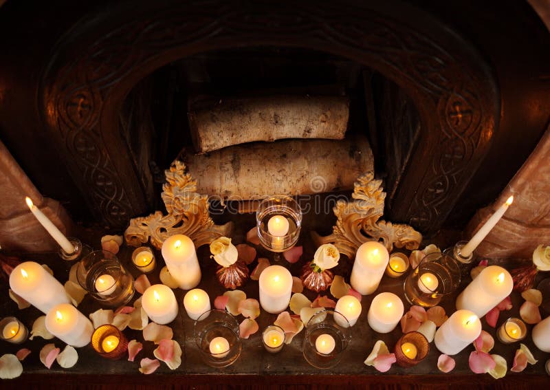 A Top View of Many Lit Candles in Front of a Fireplace, Creating a ...