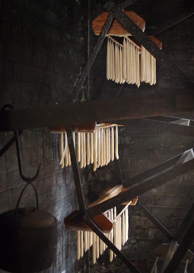 Candles Hanging on a Dipping Rack Stock Photo - Image of manufacture ...