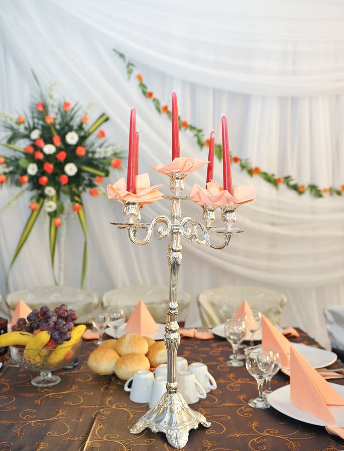 Candlestick with Candles and Floral Arrangements Stock Photo - Image of ...