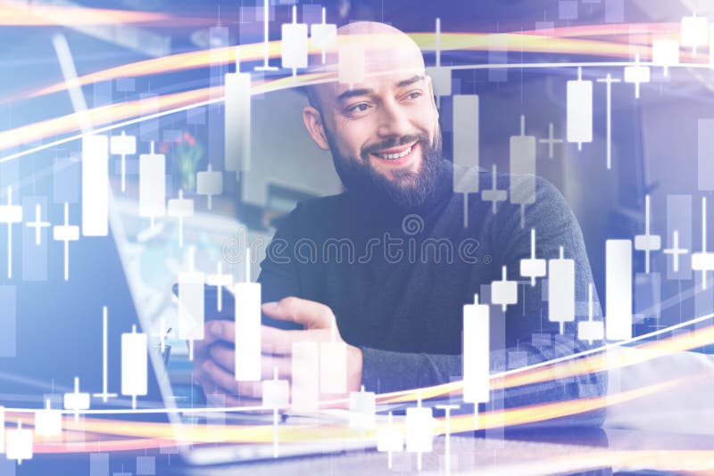 Candlestick Chart in Foreground. in Background Man in Black Turtleneck ...