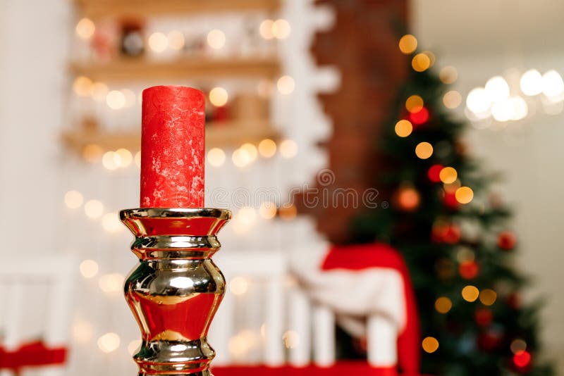 Candlestick with a Red Candle with Christmas Decor Stock Image - Image ...