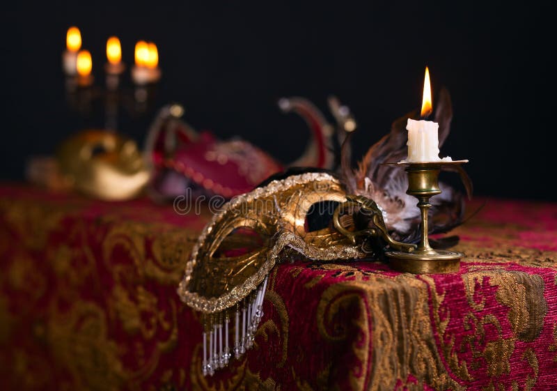 Candlestick and Venetian Mask Stock Image - Image of metal, tablecloth ...