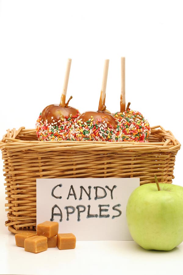 Candy Apples in a Basket for Sale Vertical Stock Image - Image of ...