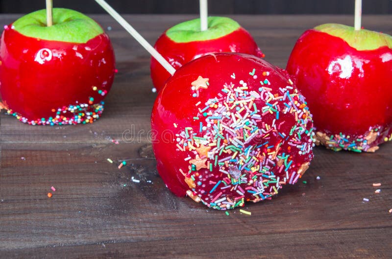 Candy Apples on Wooden Table Stock Image - Image of apple, confection ...