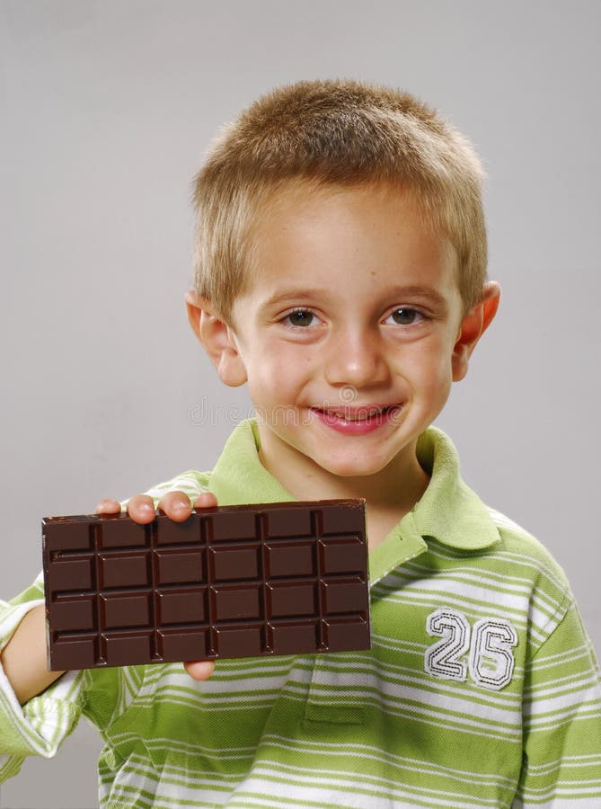 318 Cute Boy Eating Chocolate Bar Stock Photos - Free & Royalty-Free ...