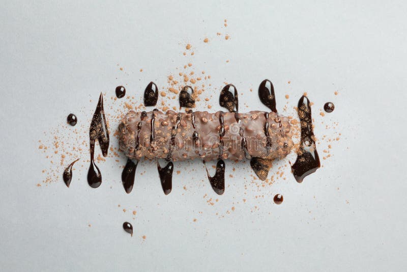 Candy Bar with Sauce and Powder on Gray Background Stock Photo - Image ...