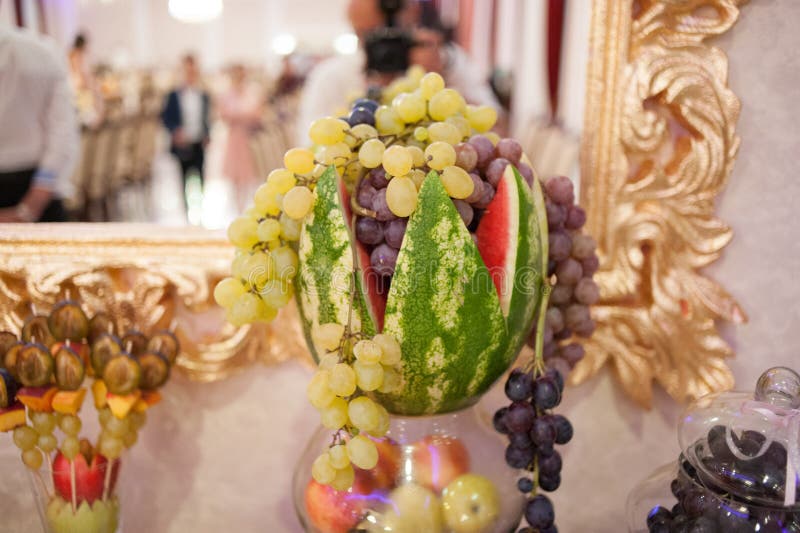 Candy Bar.Different Delicious Fruits on Wedding Reception Table with ...