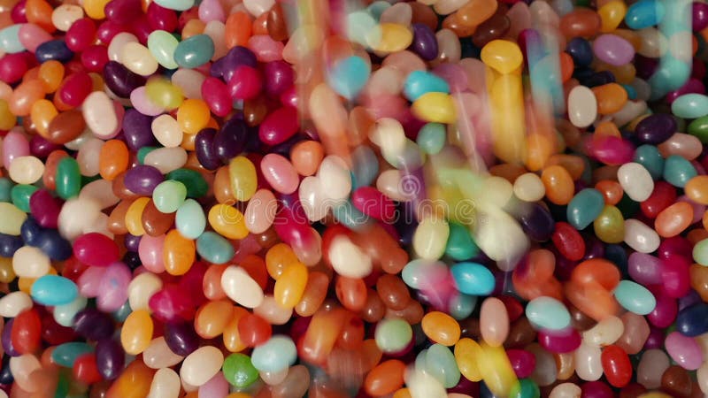 Candy Beans Poured on White Fill Up Screen Stock Video - Video of foods ...
