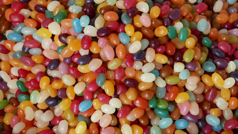 Candy Beans Poured on White Fill Up Screen Stock Video - Video of foods ...