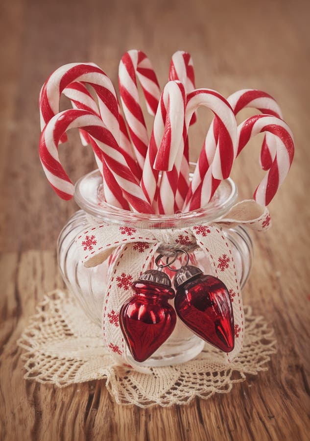 Candy cane with red ribbon stock image. Image of decoration - 11840013