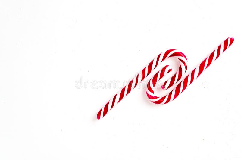 Candy Canes on a White Surface, Top View, Place for Text Stock Photo ...