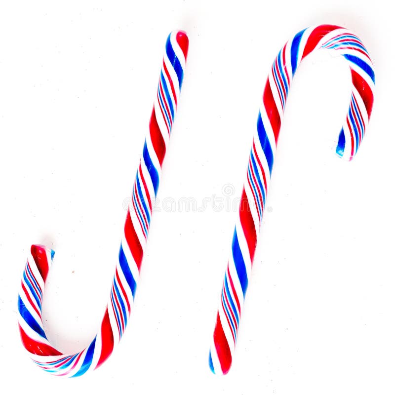 Candy Canes on a White Surface, Top View, Place for Text Stock Photo ...