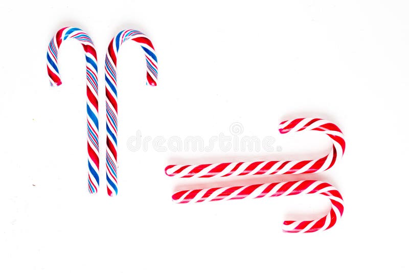 Candy Canes on a White Surface, Top View, Place for Text Stock Photo ...