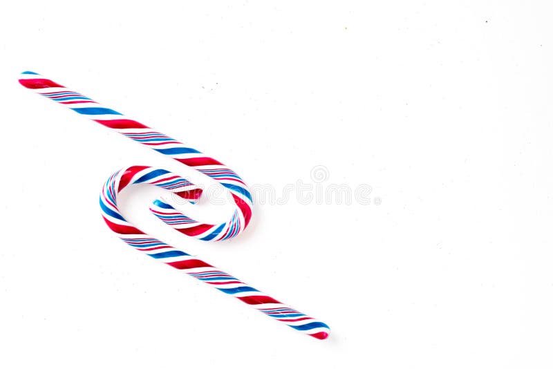 Candy Canes on a White Surface, Top View, Place for Text Stock Photo ...