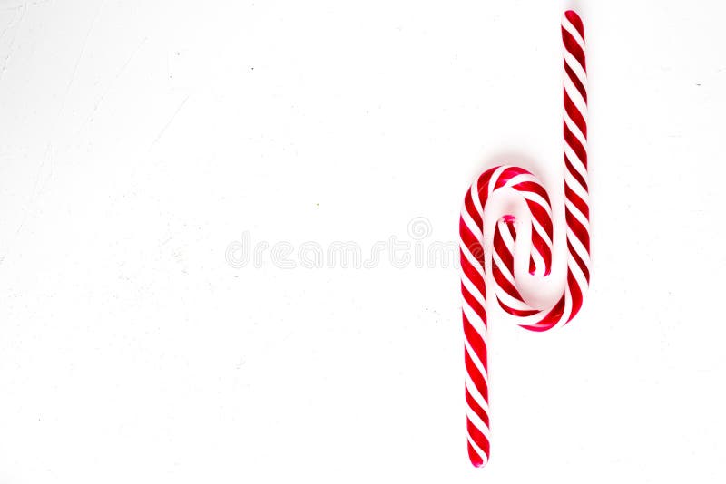 Candy Canes on a White Surface, Top View, Place for Text Stock Image ...