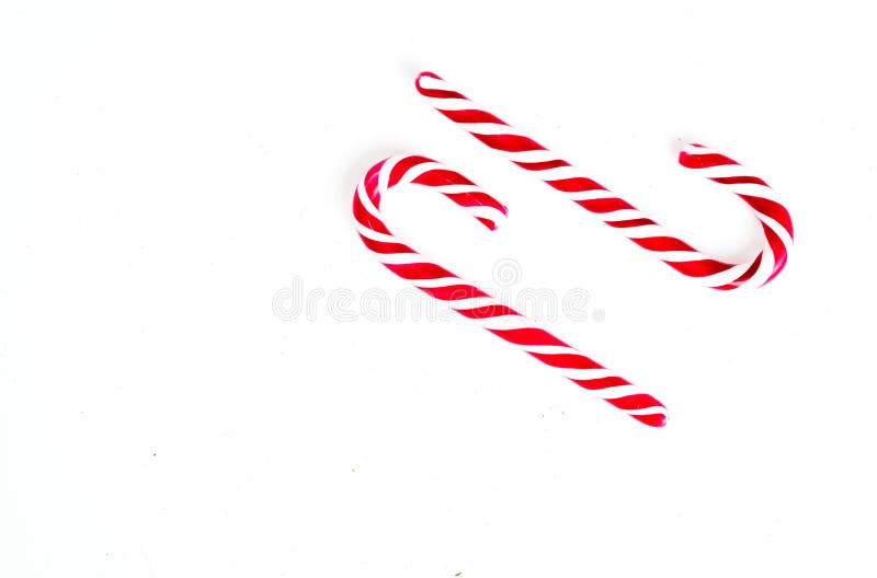 Candy Canes on a White Surface, Top View, Place for Text Stock Image ...