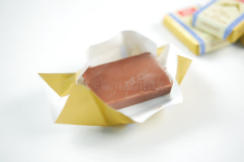 Candy Chocolate in a Paper Packet on White Stock Image - Image of tasty ...