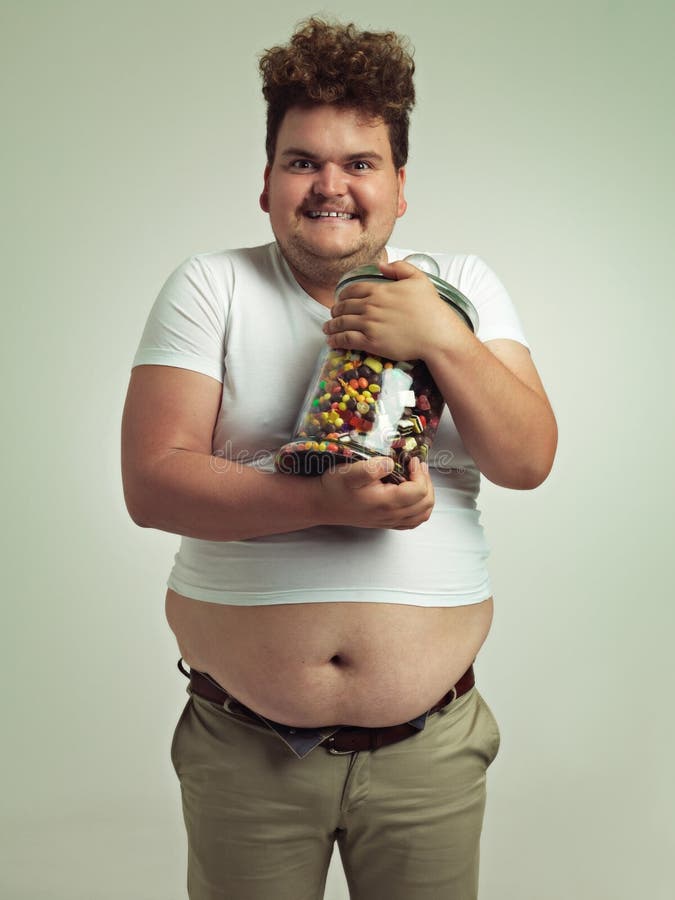 Candy, Crazy and Portrait of Plus Size Man in Studio for Luxury Snacks ...