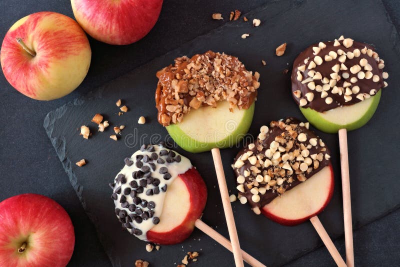 Candy Dipped Apple Rounds, Above on Slate Stock Photo - Image of ...