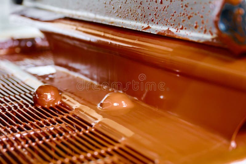Candy Enrobing Process Showcasing Curtain Coating Technique with ...