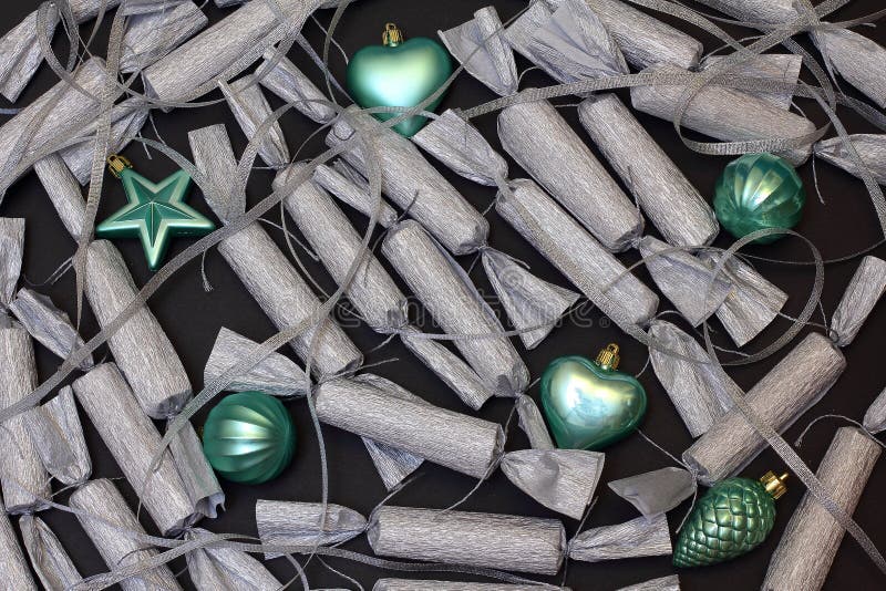 Candy in a Silver Wrapper on a Black Background. New Year Decor Stock ...