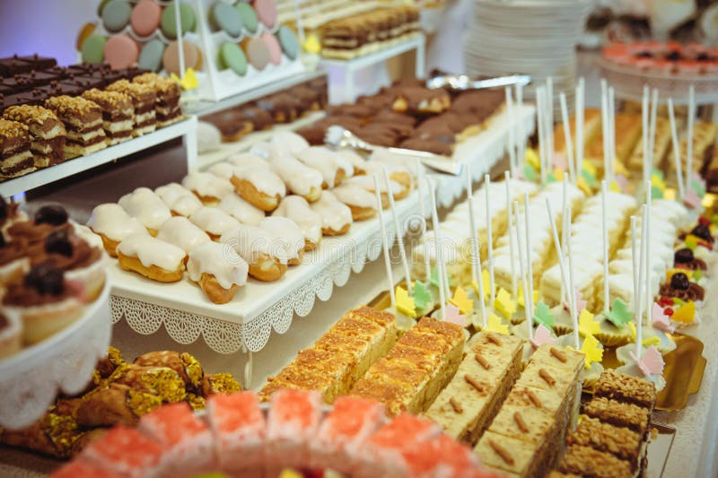 Candy table with sweets stock photo. Image of sweets - 303710064