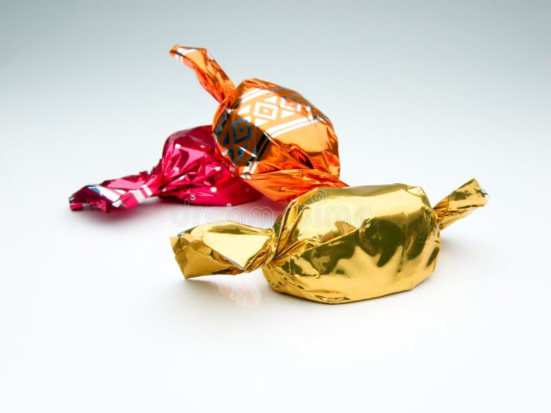Candy Wrapped in Pink Foil stock photo. Image of aluminum - 23527980